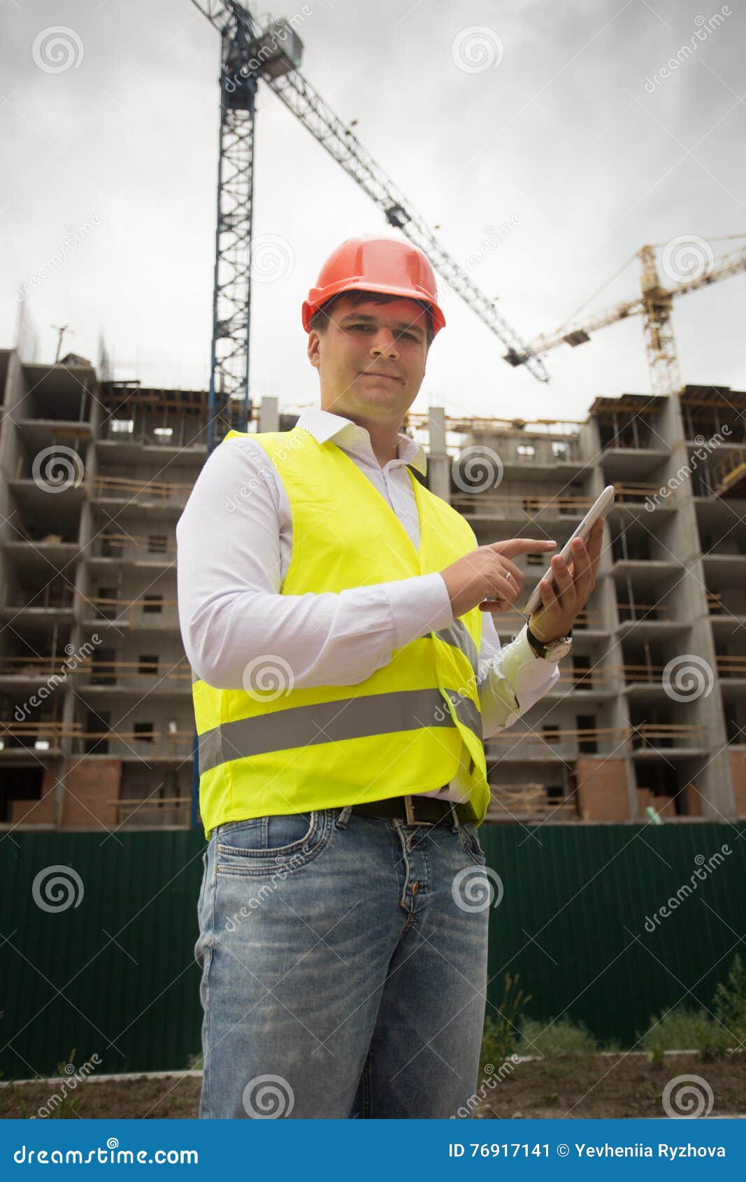 Smiling Engineer Using Digital Tablet at Building Site Stock Image ...
