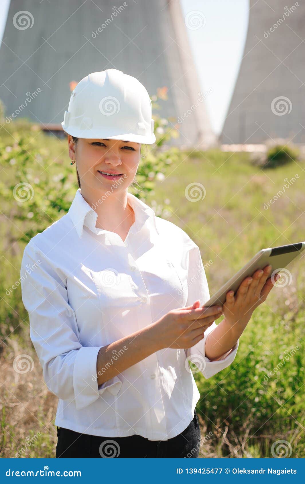 Smiling Engineer Woman with Tablet on Electric Station Stock Image ...