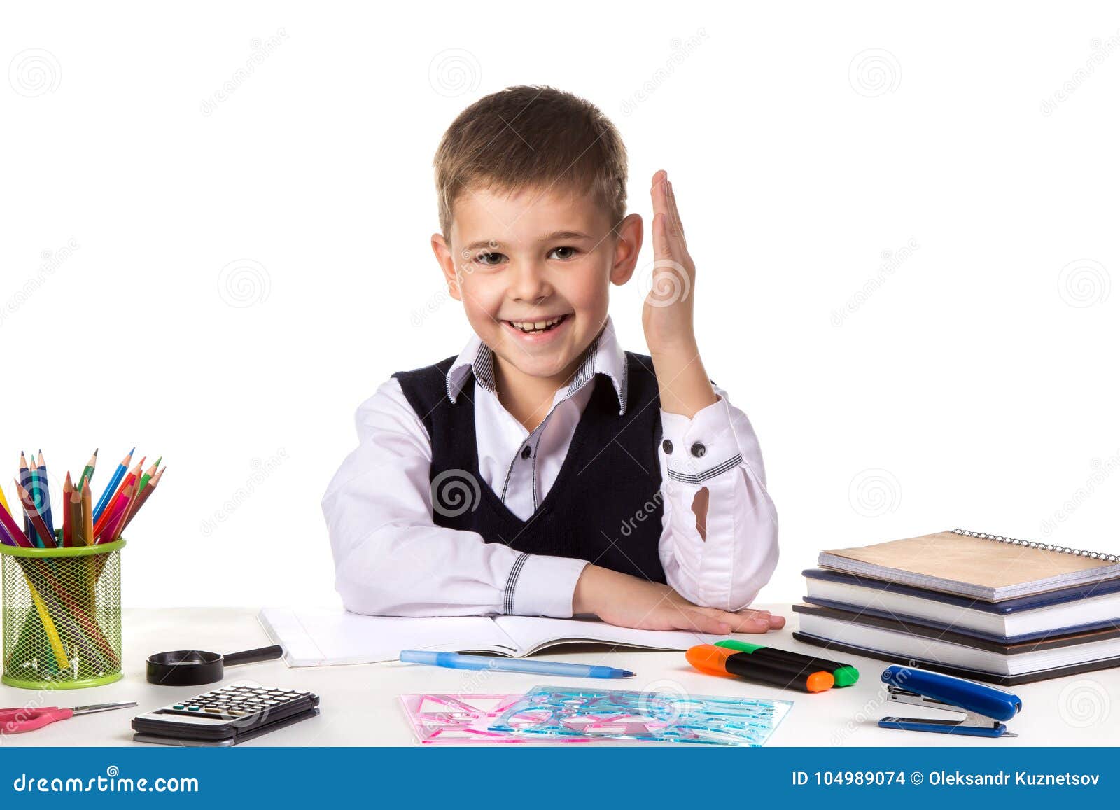 Smiling Excellent Pupil with Hand Up Sitting at the Table on the White ...