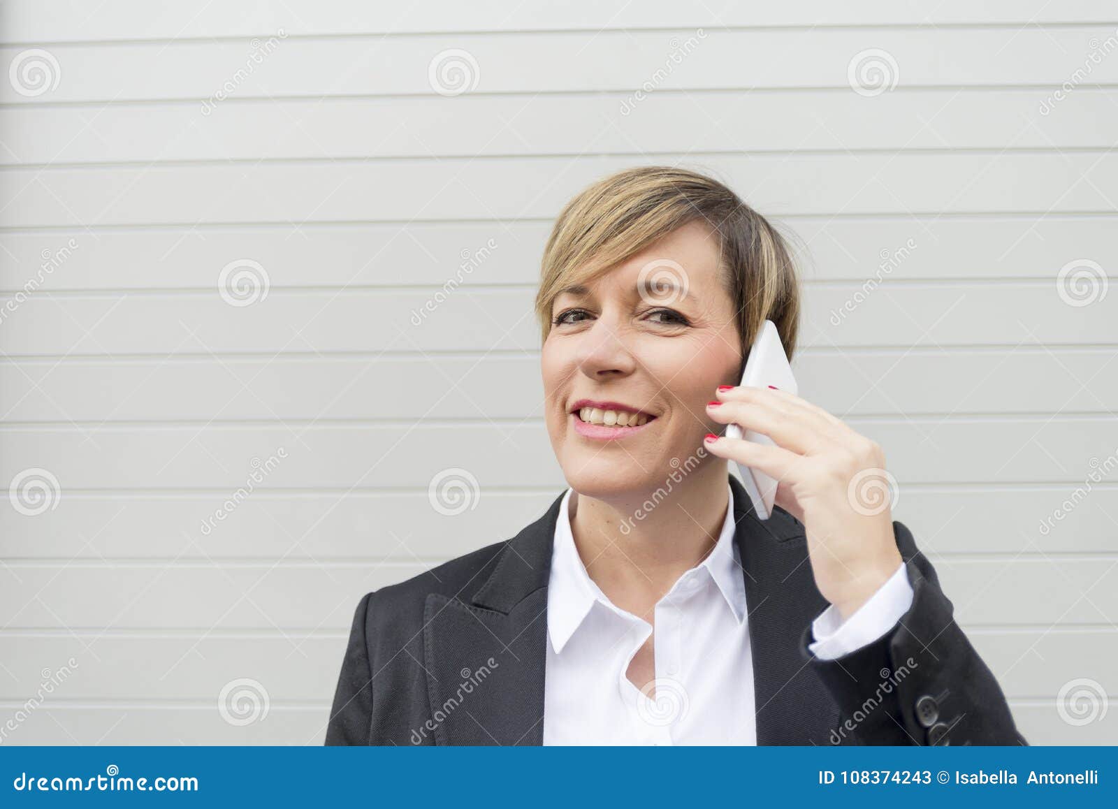 Executive Talking on Phone Looking at Camera on the Street Stock Image ...