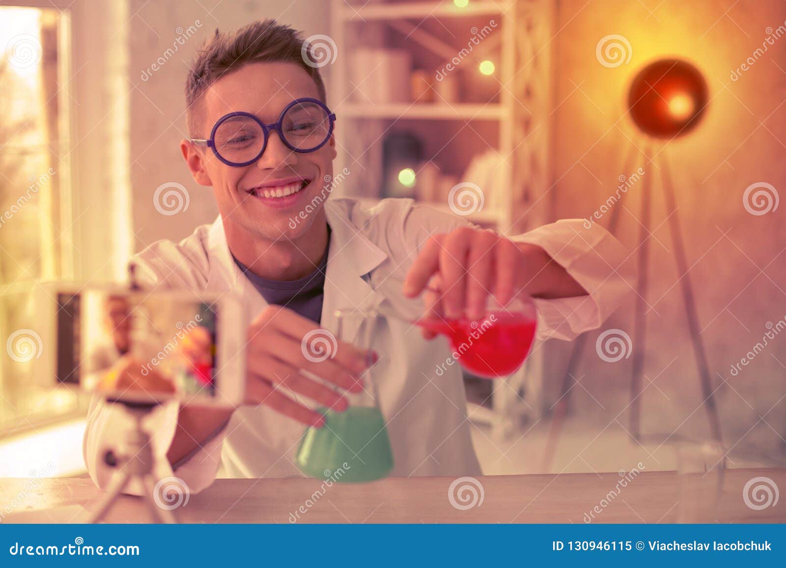 Smiling Experimenter Making a Video about Chemistry Stock Image - Image ...