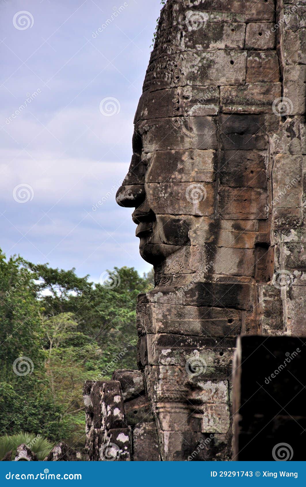 Smiling face in Angkor Wat stock image. Image of cambodian - 29291743