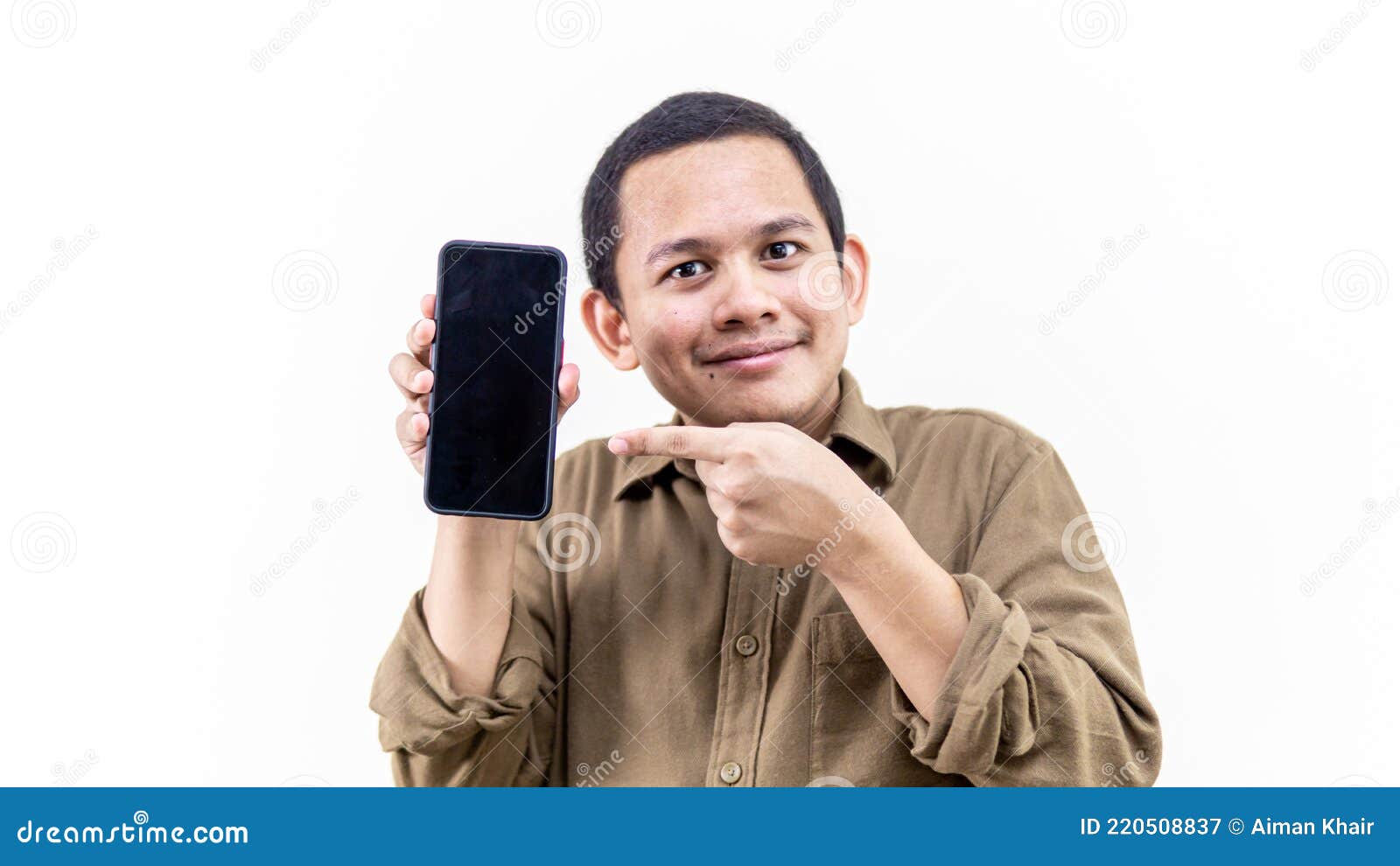 Smiling Face Expression of Young Asian Malay Man Holding a Smartphone ...
