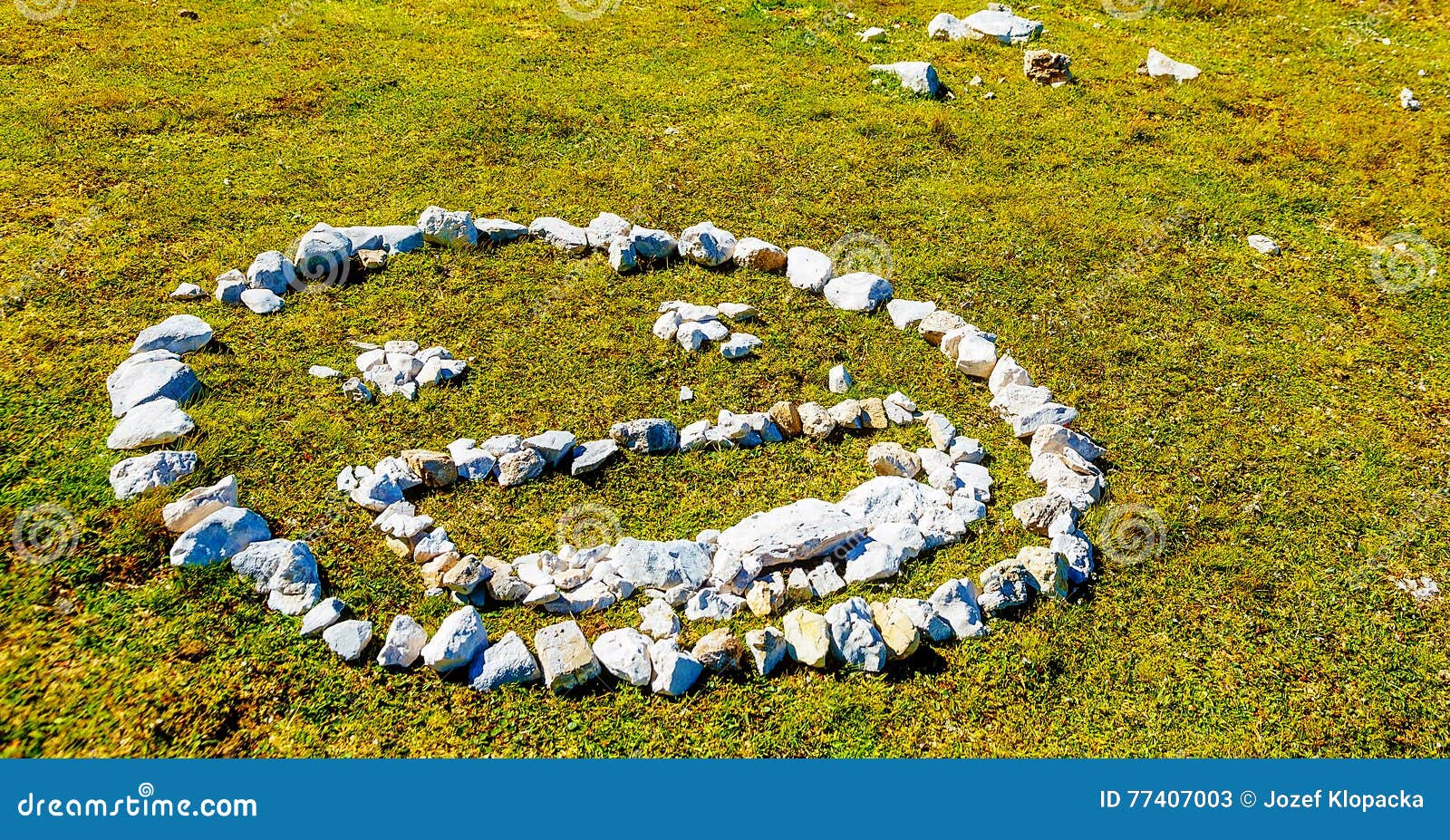 Smiling Face Icon Made of Pebble Stones on Mountain Meadow Stock Image ...