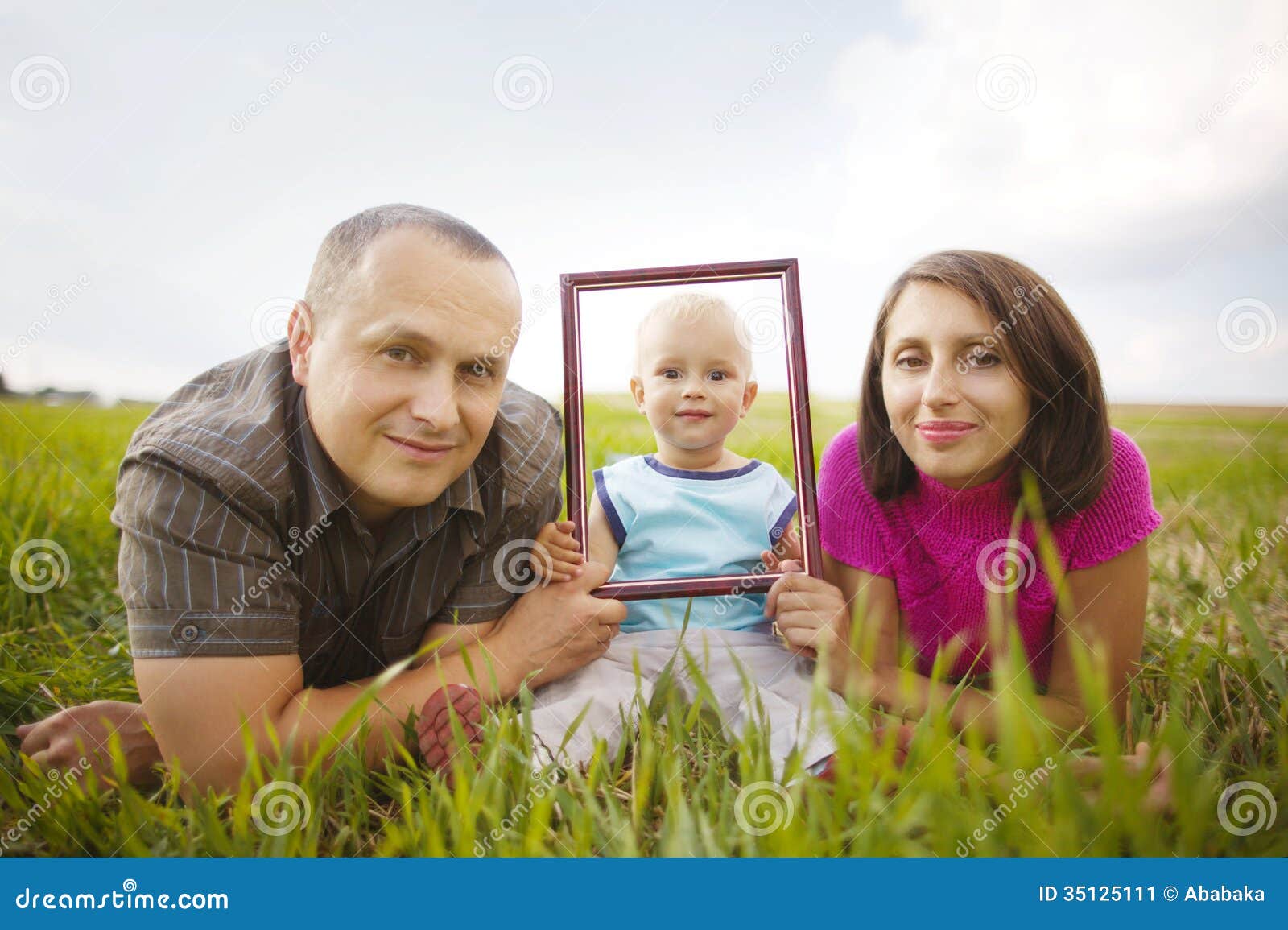 Smiling Family through Frame Stock Image - Image of husband, caucasian ...