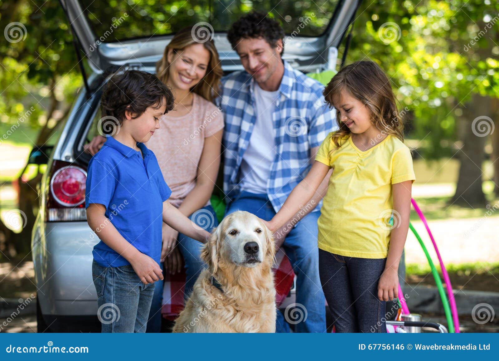 Smiling Family in Front of a Car Stock Photo - Image of female ...