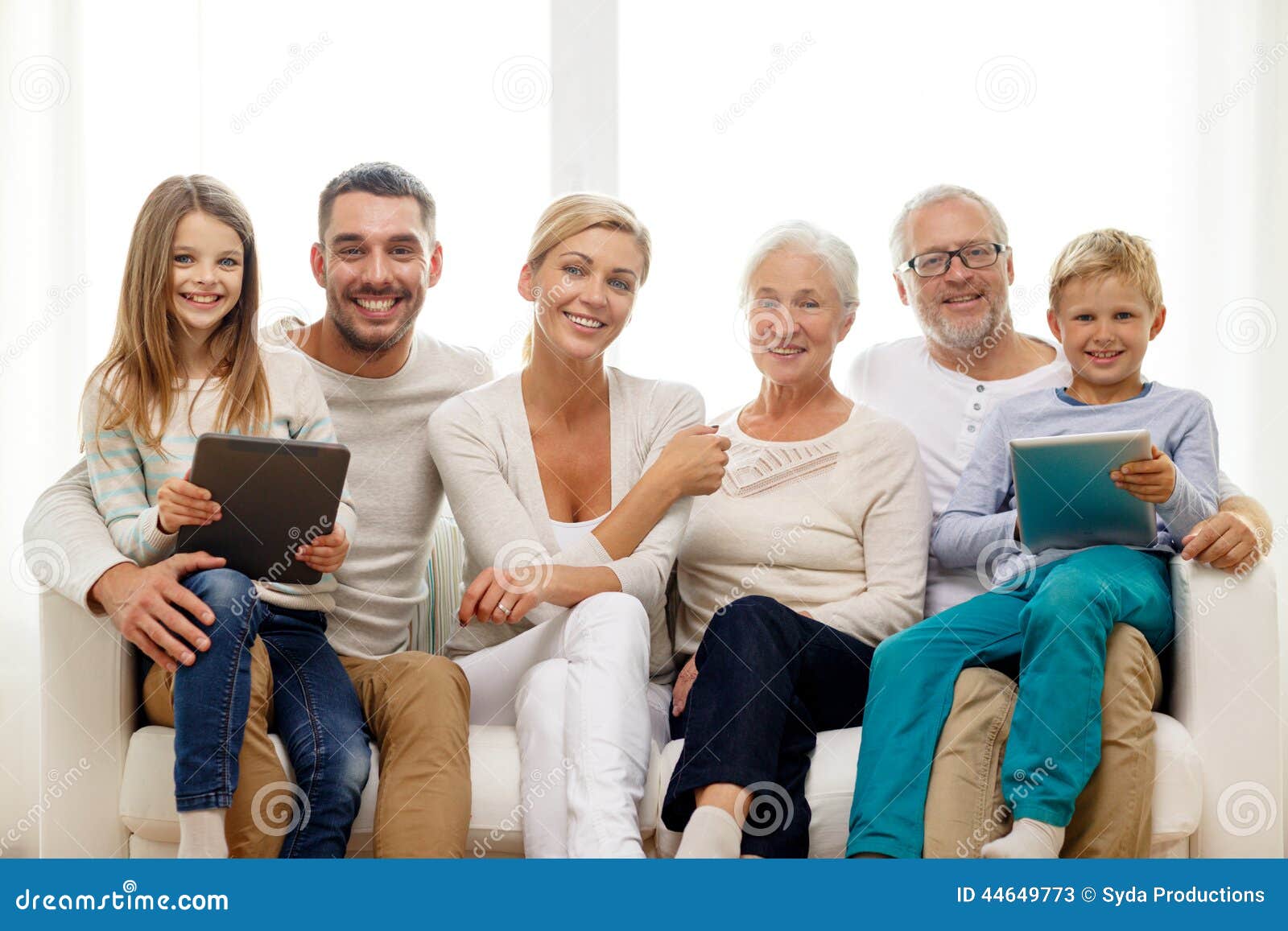 Smiling Family with Tablet Pc at Home Stock Image - Image of ...