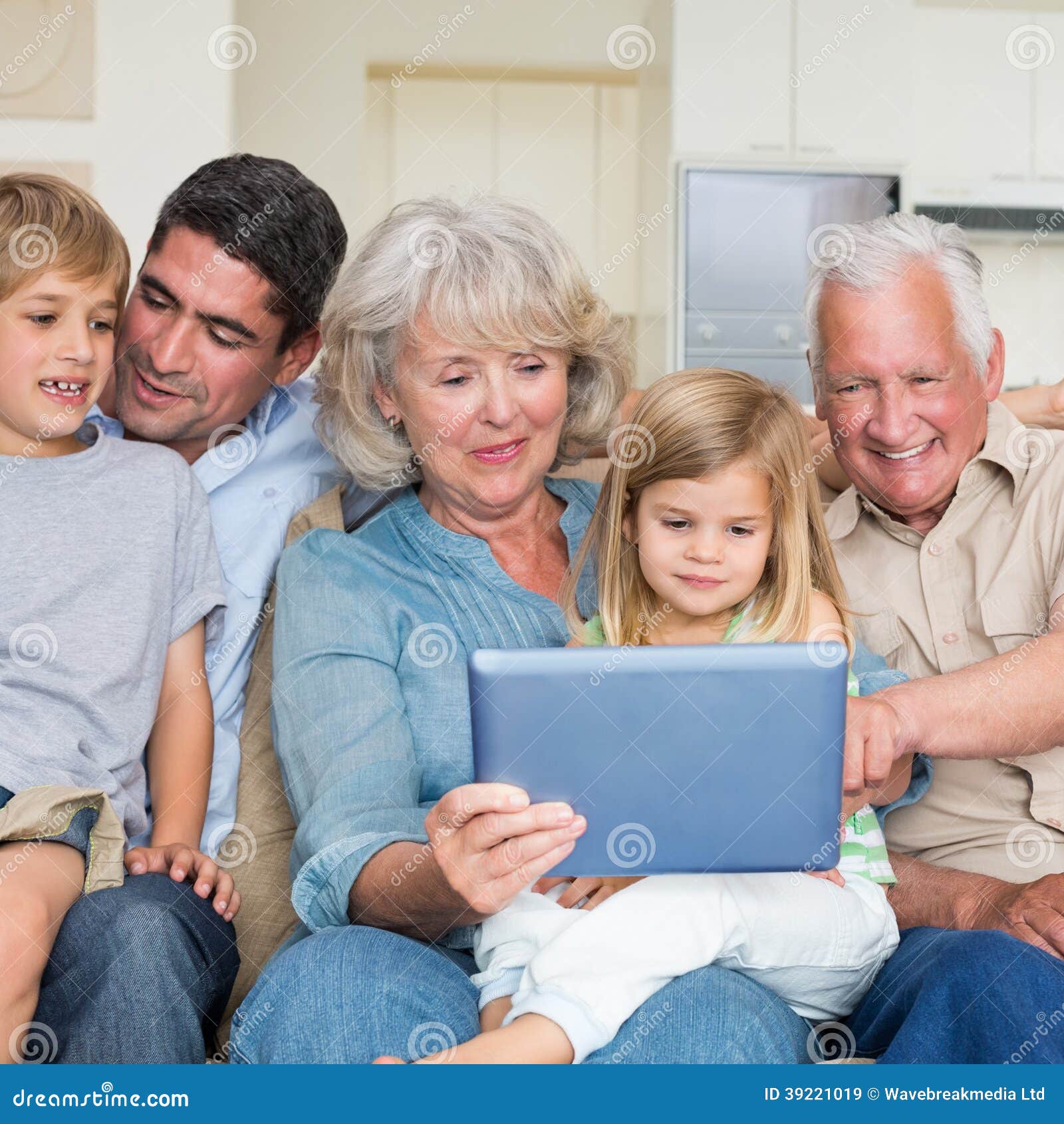 Smiling Family Using Digital Tablet Stock Image - Image of home ...