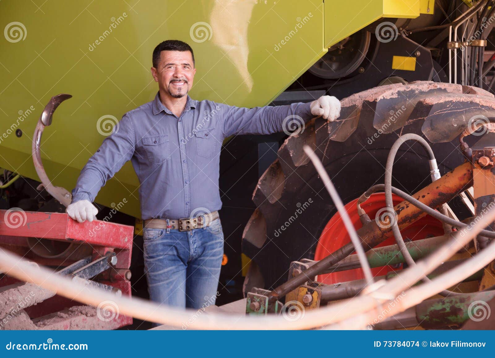 Smiling Farmer Driver Standing with Big Field Stock Photo - Image of ...