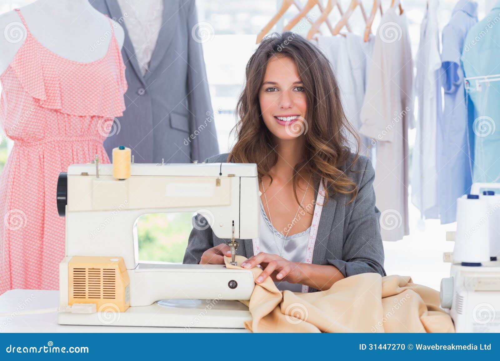 Smiling Fashion Designer Using Sewing Machine Stock Photo - Image of ...