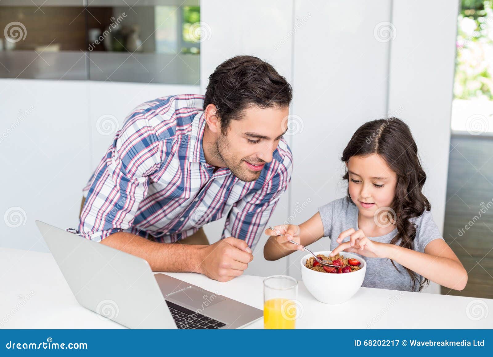 Smiling Father and Daughter at Breakfast Table Stock Image - Image of ...