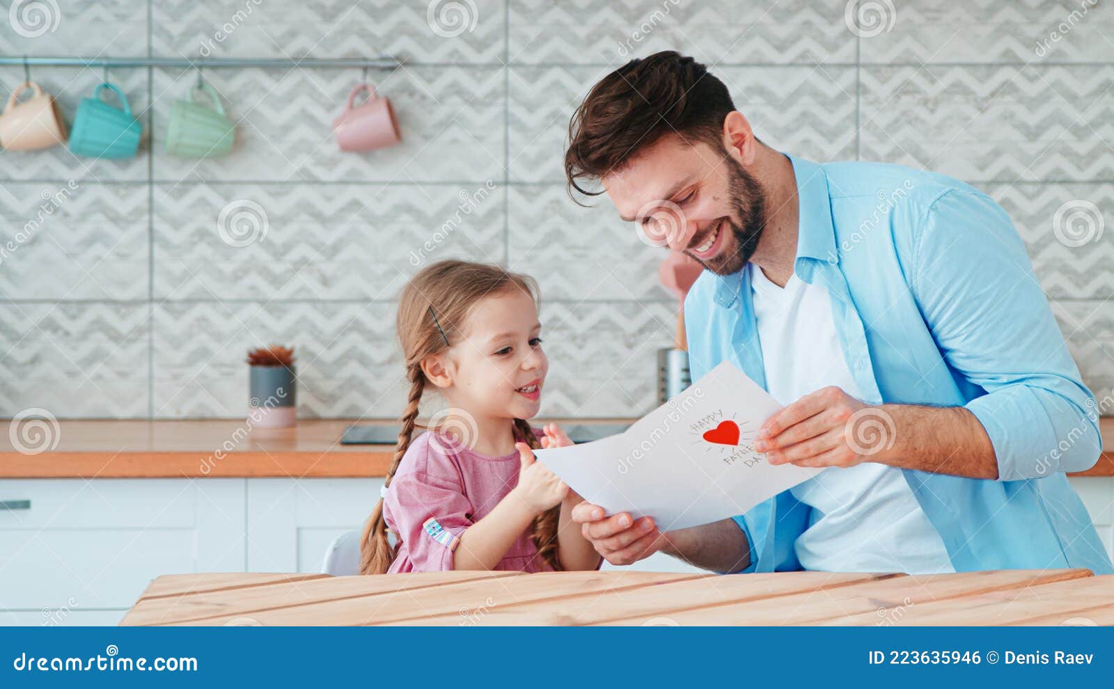 Smiling Father Reading Postcard from Daughter for Father`s Day Stock ...