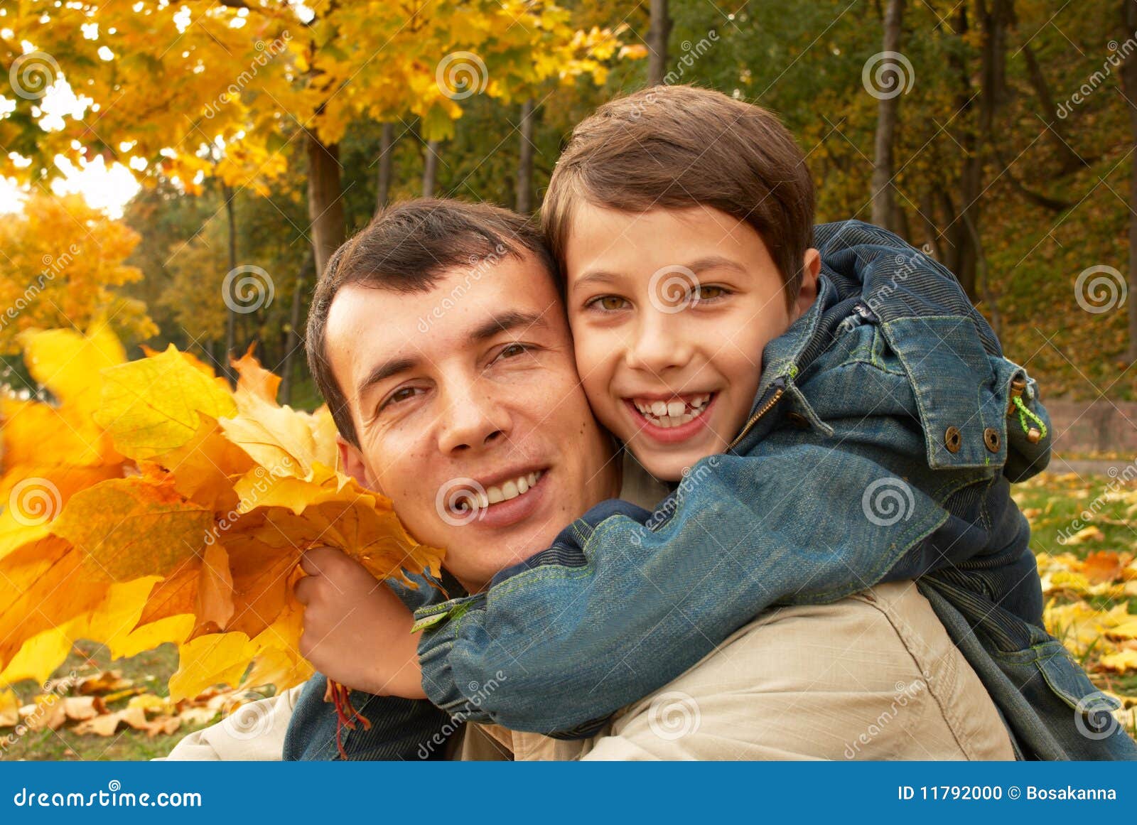 Smiling father and son stock photo. Image of golden, generation - 11792000