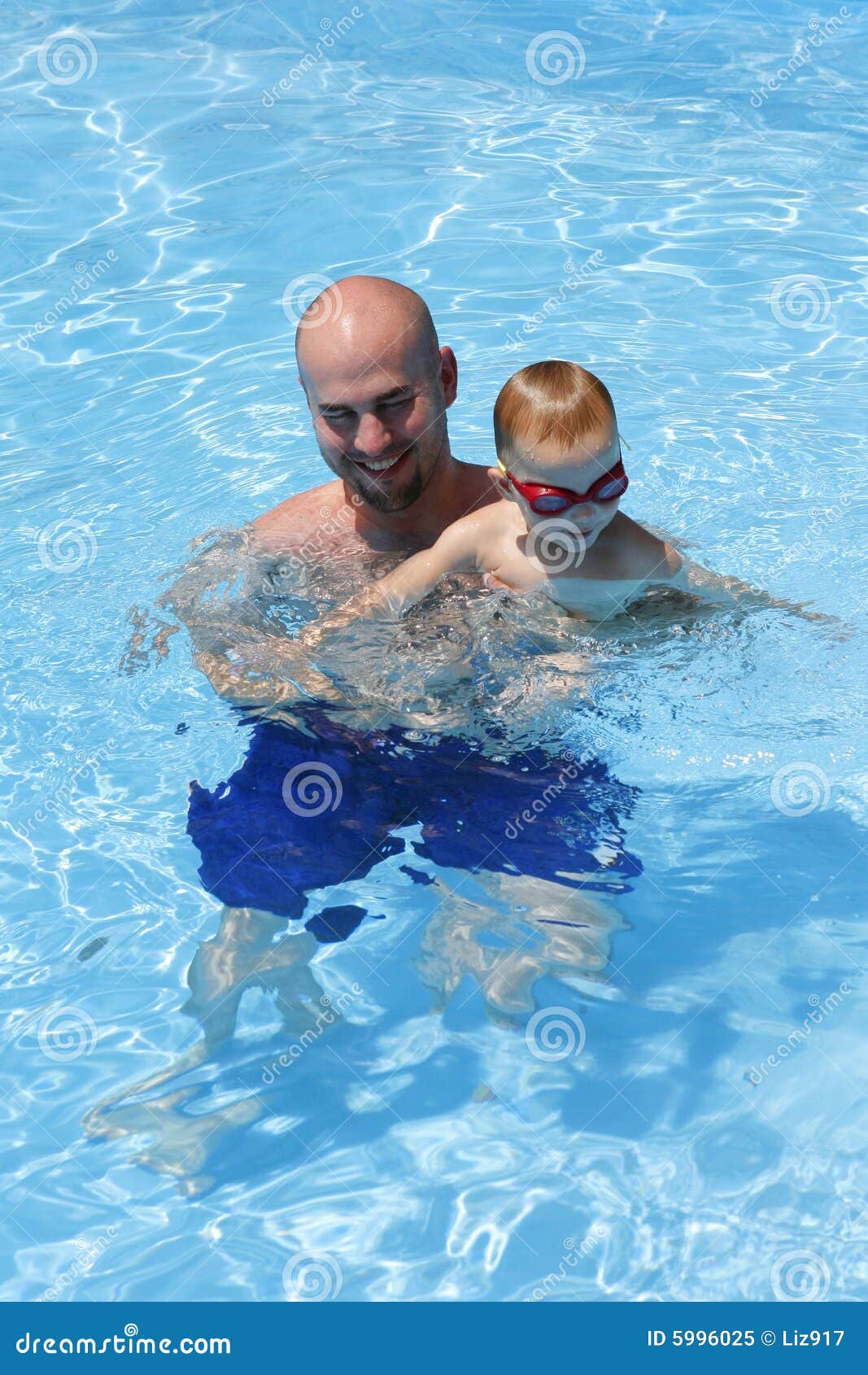 Smiling Father and Son in Swimming Pool Stock Image - Image of daddy ...