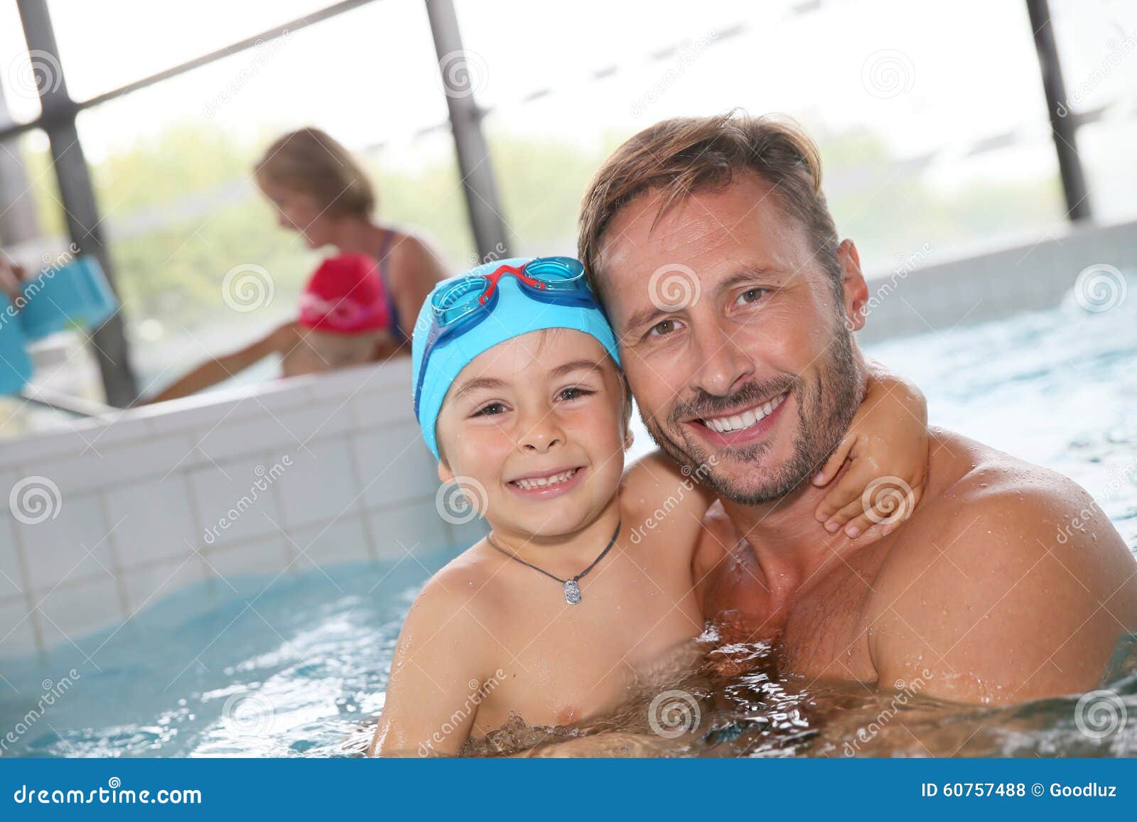 Smiling Father and Son in Swimming Pool Stock Photo - Image of handsome ...