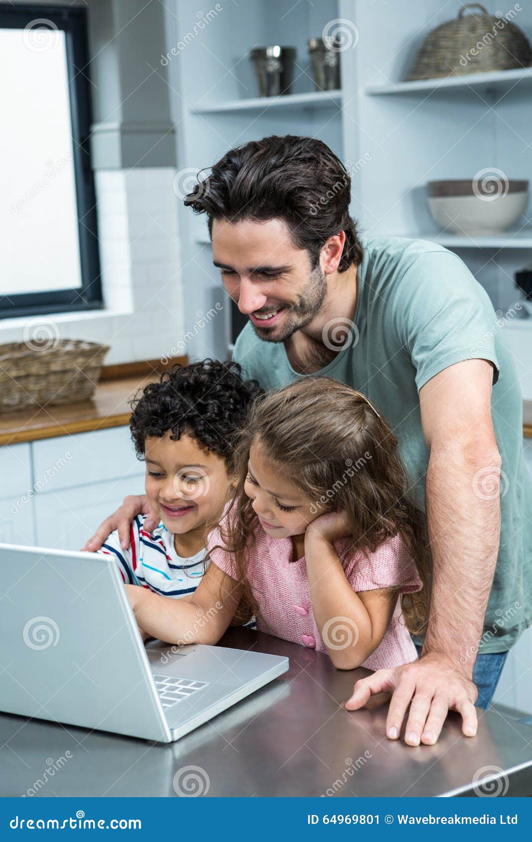 Smiling Father Using Laptop with His Children Stock Image - Image of ...