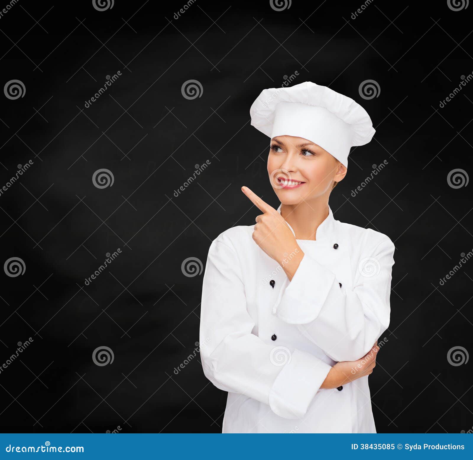 Smiling Female Chef Pointing Finger To Something Stock Image - Image of ...