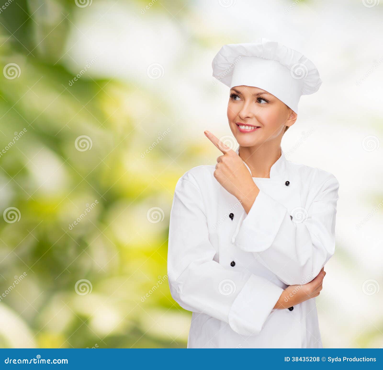 Smiling Female Chef Pointing Finger To Sonething Stock Photo - Image of ...