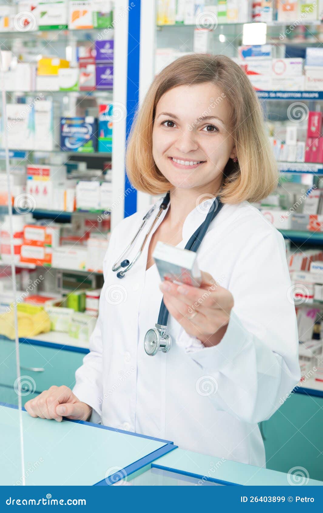 Smiling Female Chemist Selling Drugs Stock Image - Image of indoors ...