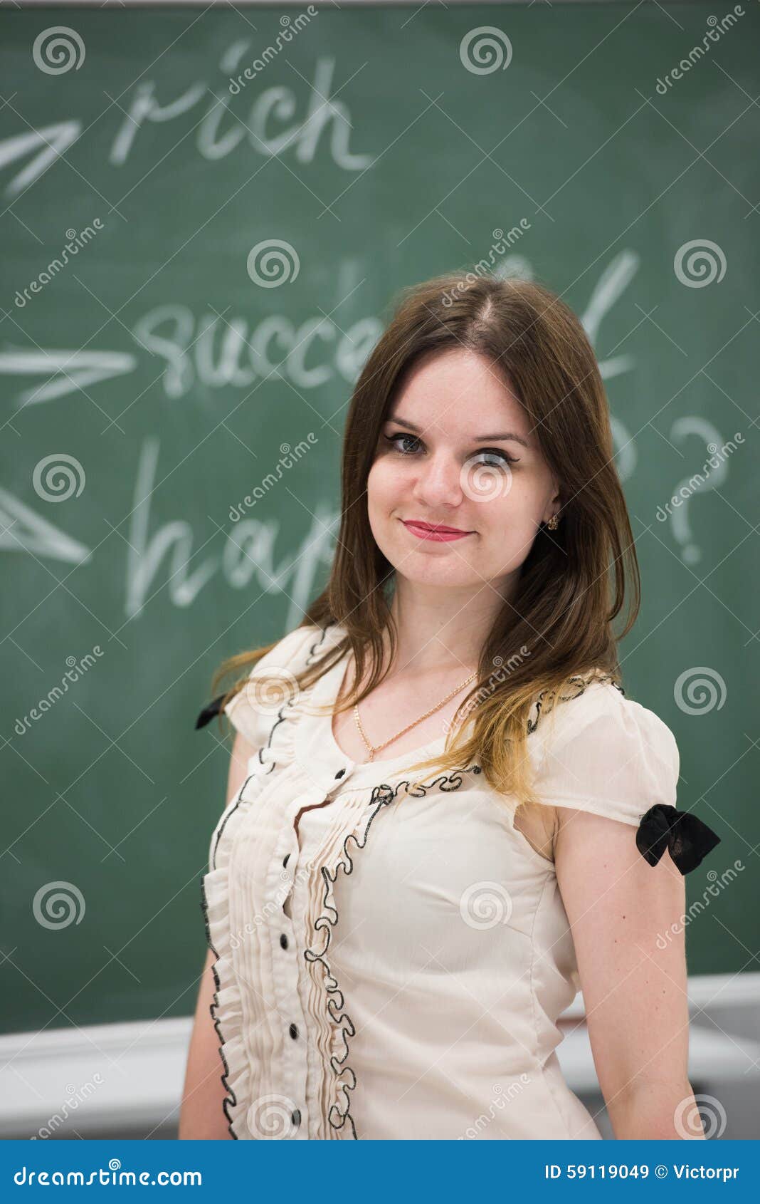 Smiling Female College Student in Front of the Blackboard Stock Image ...