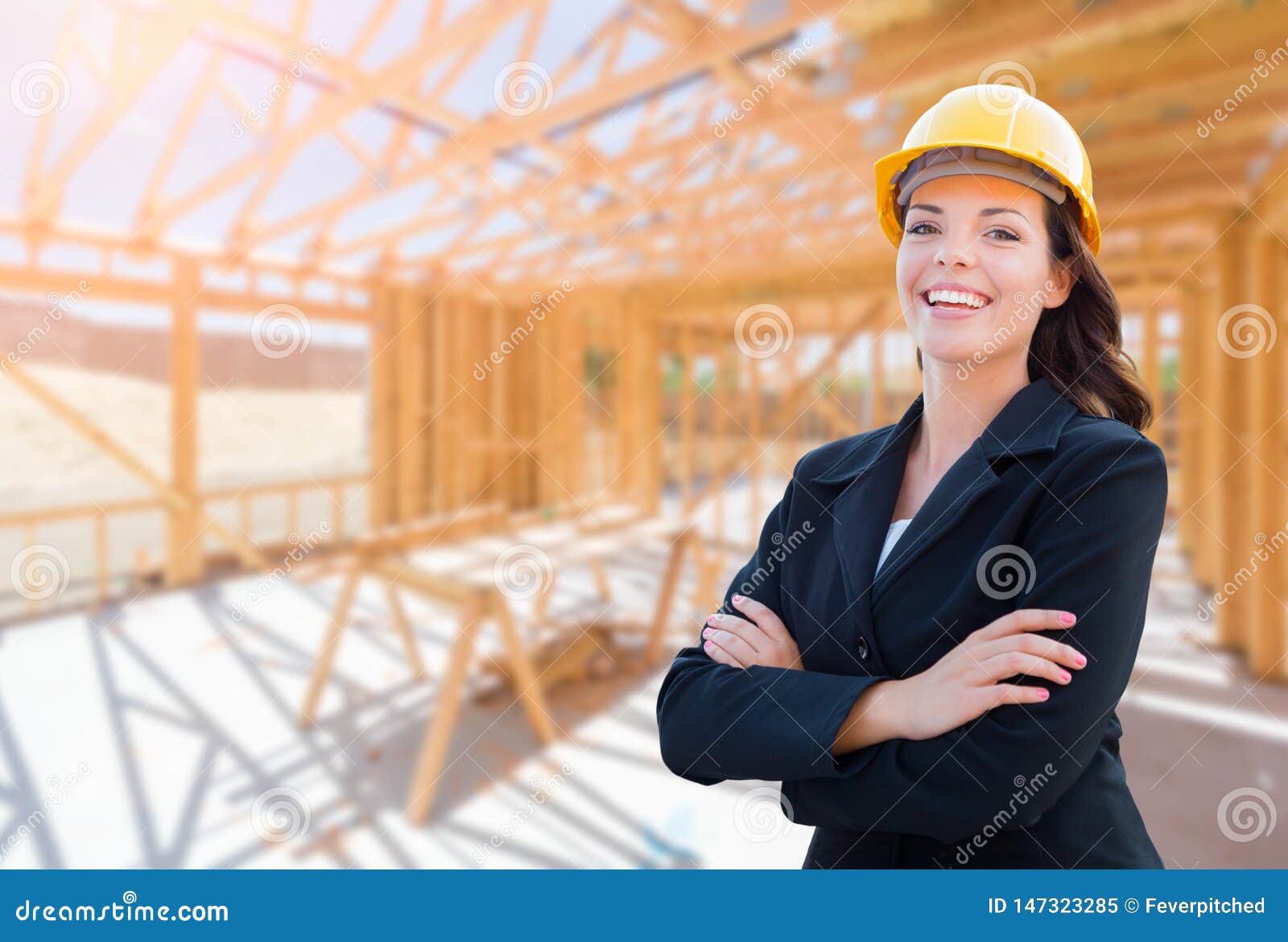 Smiling Female Contractor in Hard Hat at Construction Site Stock Image ...