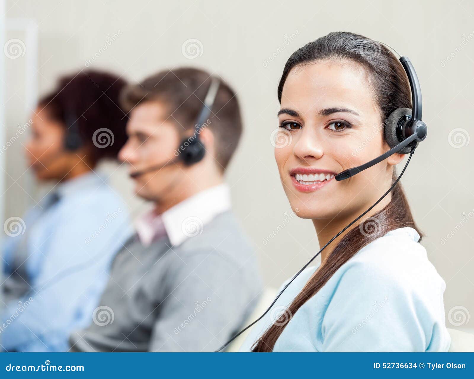 Smiling Female Customer Service Representative in Stock Photo - Image ...