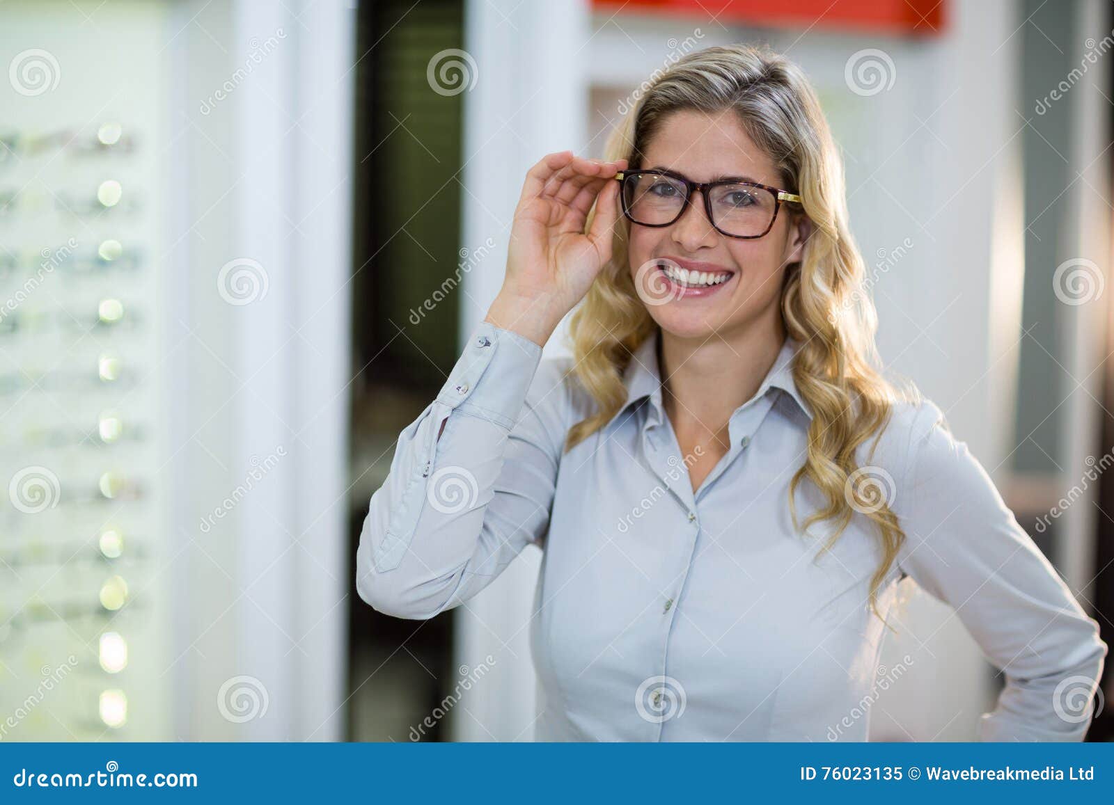 Smiling Female Customer Trying Spectacles Stock Image - Image of casual ...