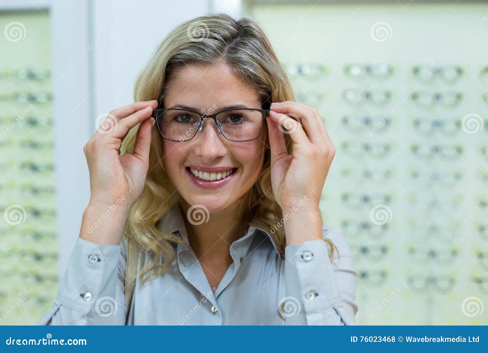 Smiling Female Customer Trying Spectacles Stock Photo - Image of ...