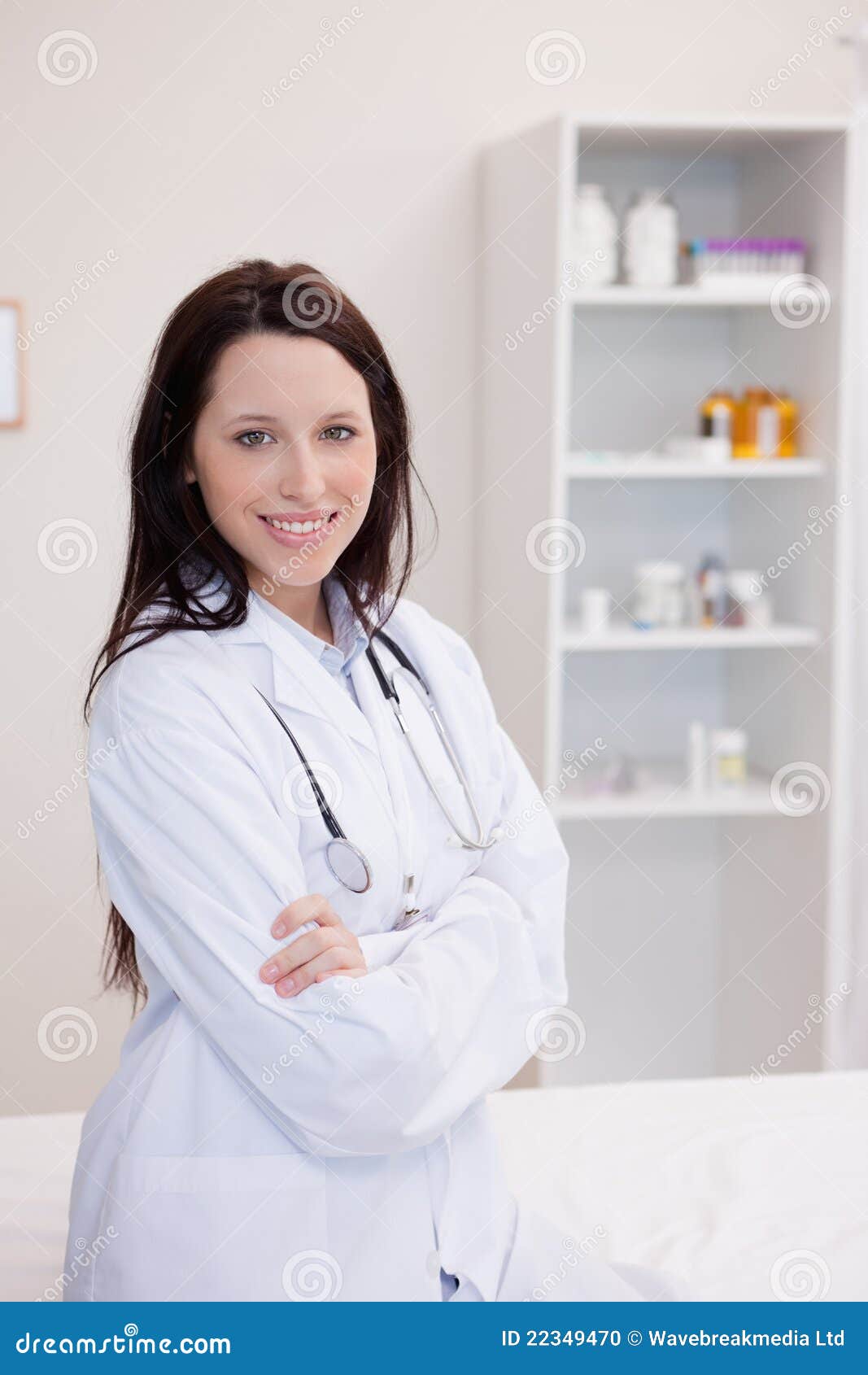 Smiling Female Doctor with Folded Arms Stock Photo - Image of ...