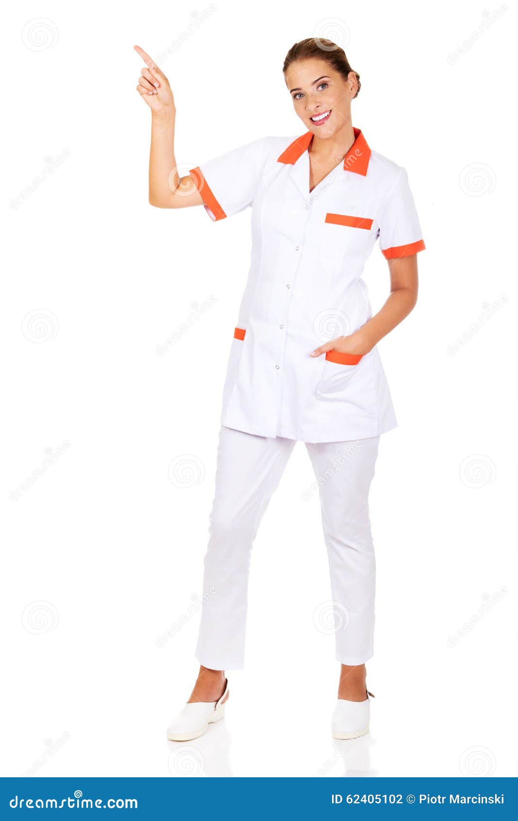 Smiling Female Doctor or Nurse Pointing at Something Stock Photo ...