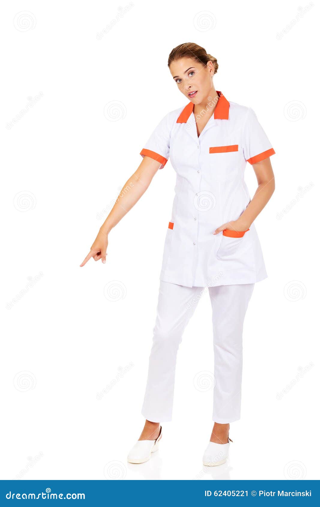 Smiling Female Doctor or Nurse Pointing at Something Stock Image ...