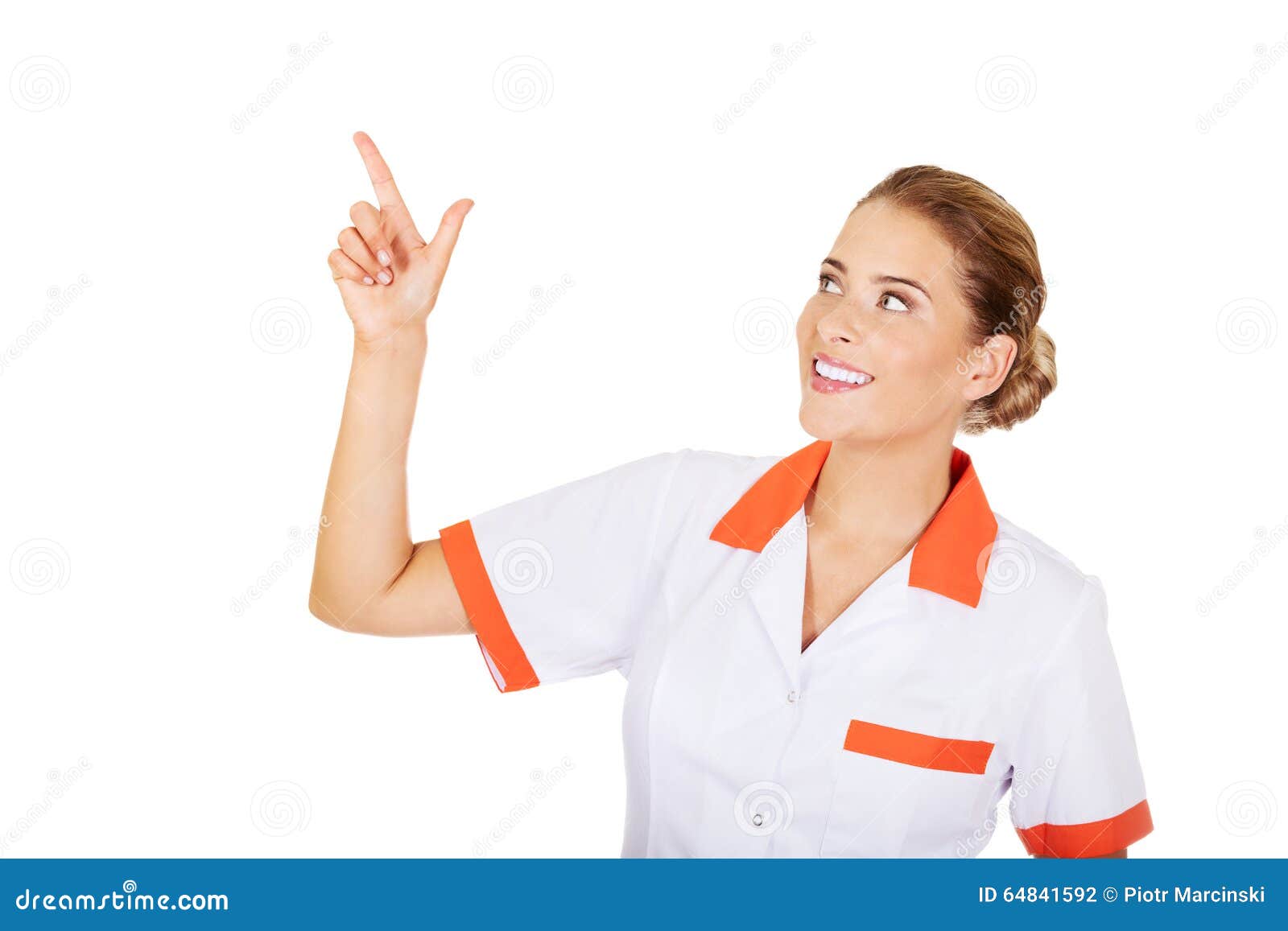 Smiling Female Doctor or Nurse Pointing at Something Stock Photo ...