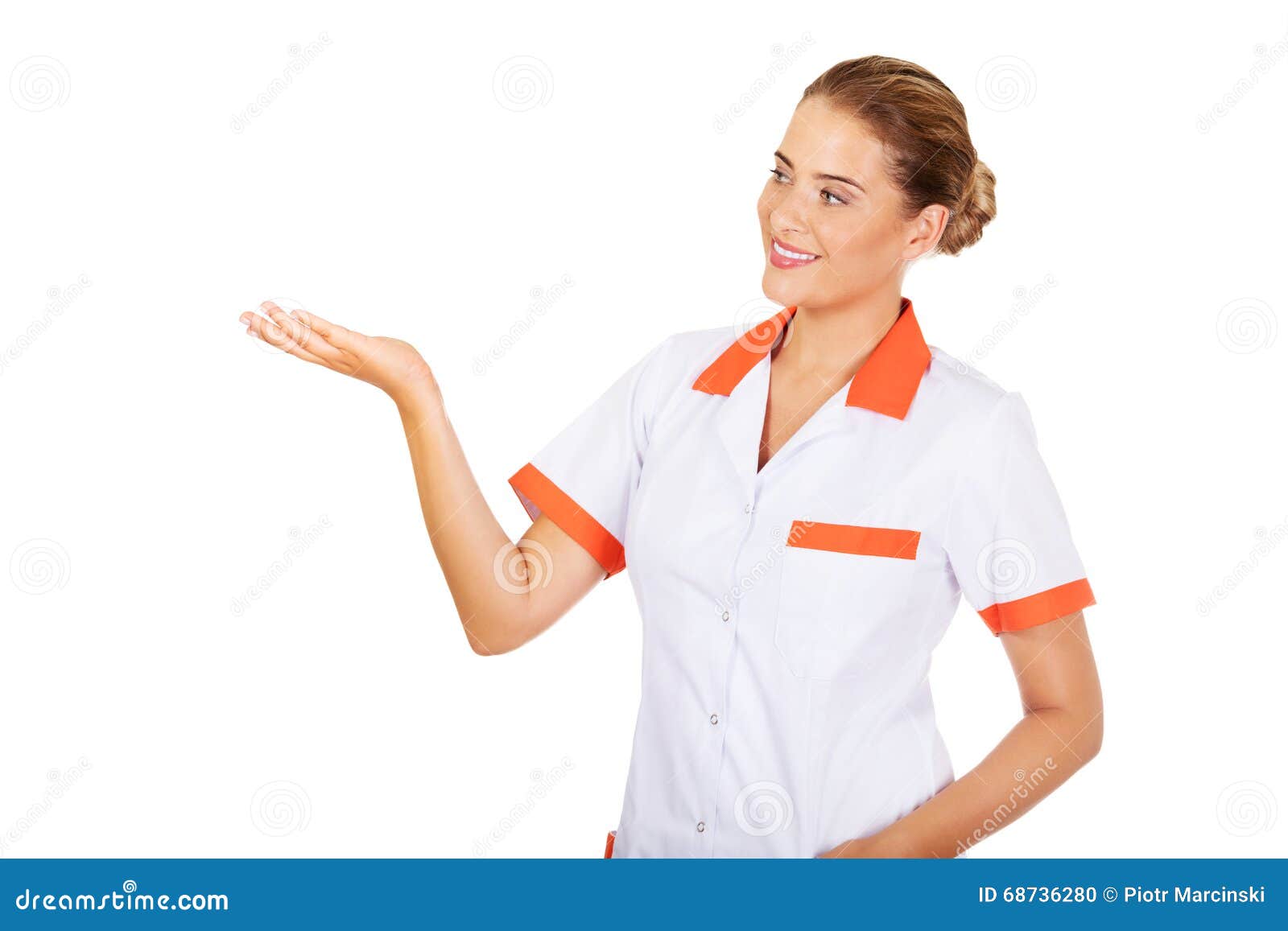 Smiling Female Doctor or Nurse Pointing at Something Stock Photo ...