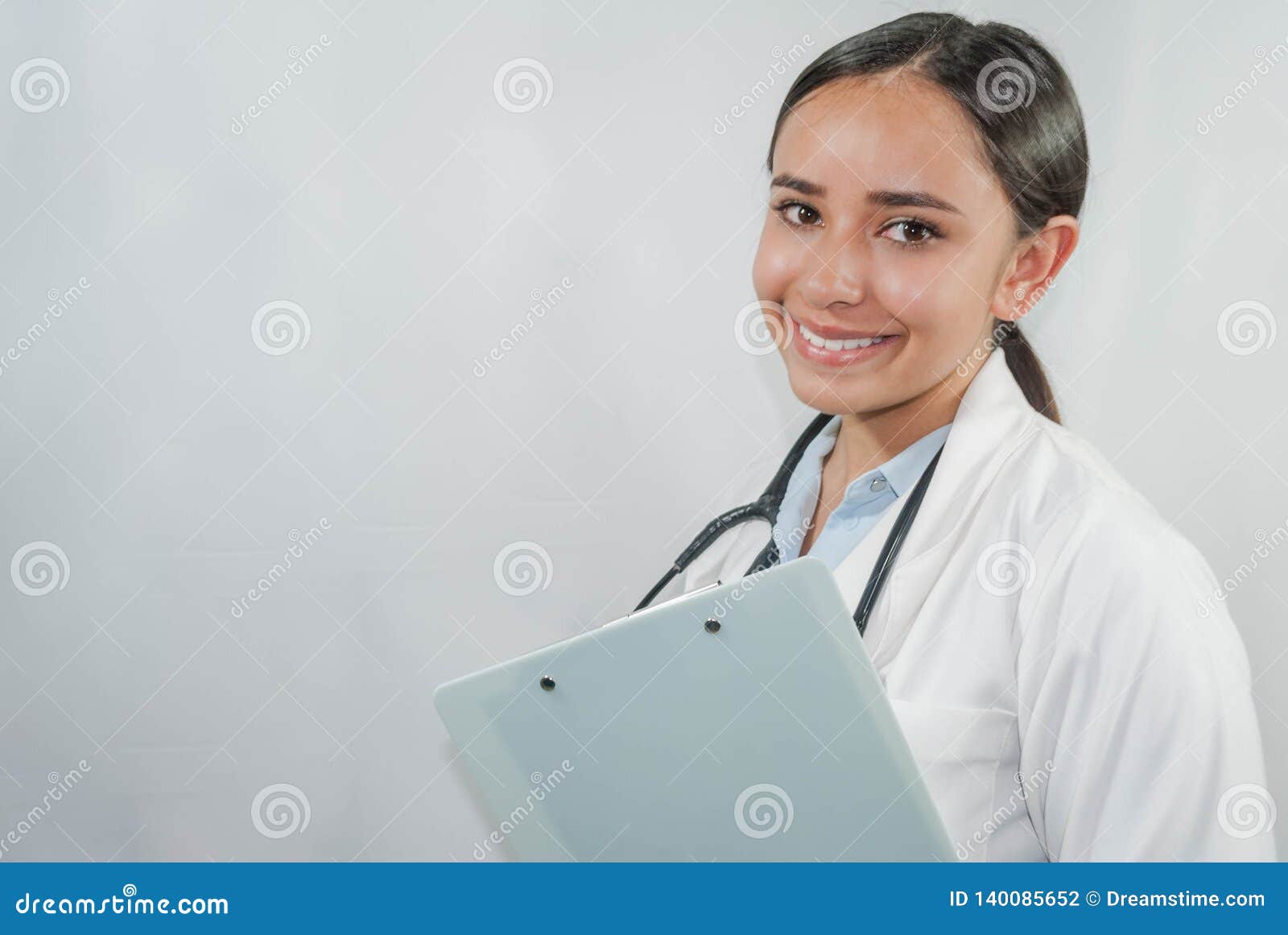 Smiling female doctor stock photo. Image of intern, female - 140085652 Smiling female doctor stock photo. Image of intern, female - 140085652