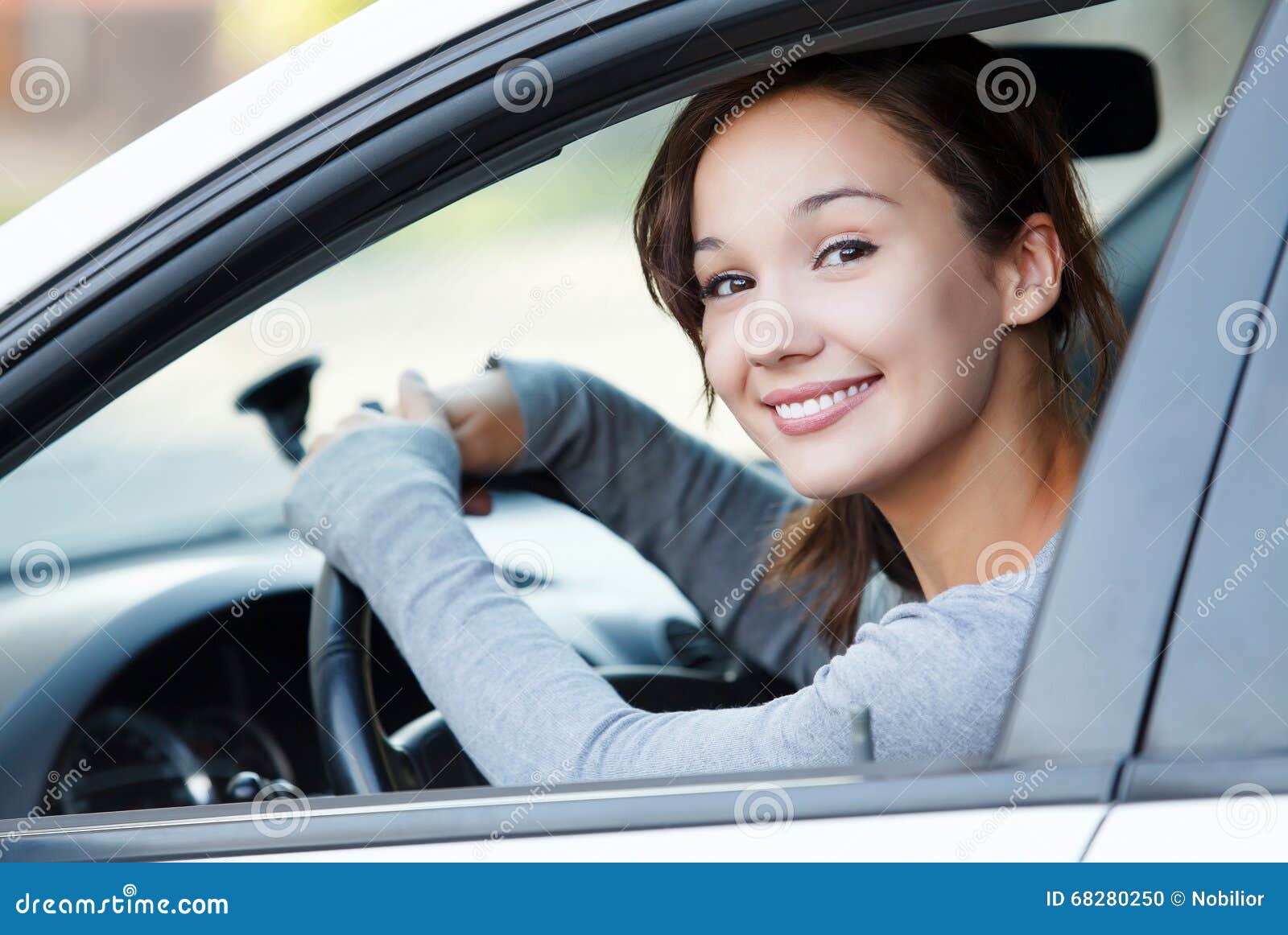 Smiling female driver stock photo. Image of casual, female - 68280250