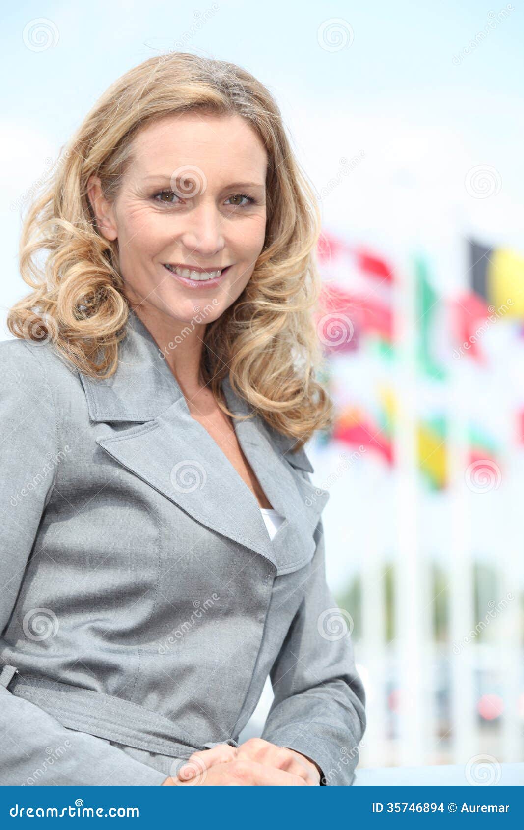 Smiling female executive stock photo. Image of suit, flagpole - 35746894