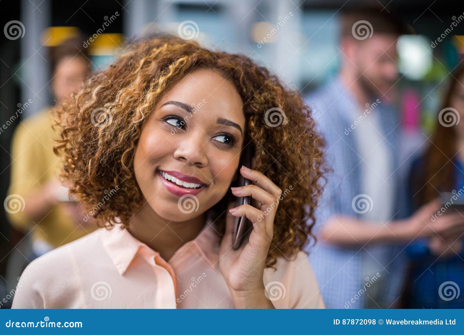 Smiling Female Executive Talking on Mobile Phone Stock Photo - Image of ...