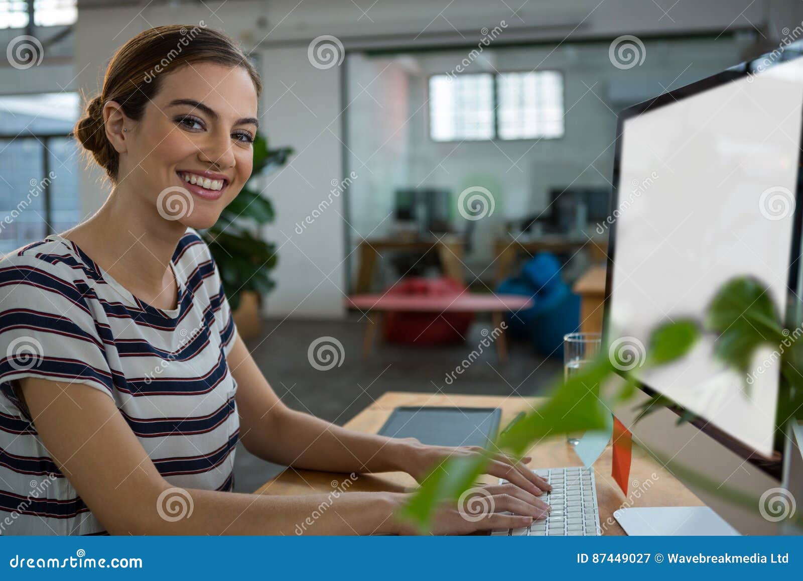 Smiling Female Graphic Designer Working on Computer Stock Image - Image ...