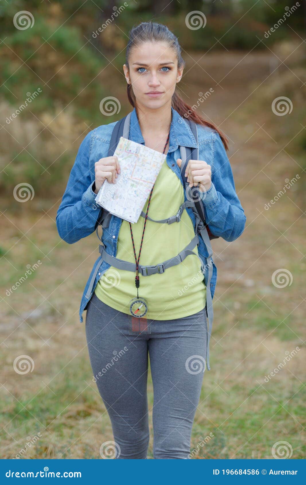 Smiling Female Hiker Hiking in Forest Stock Photo - Image of backpack ...