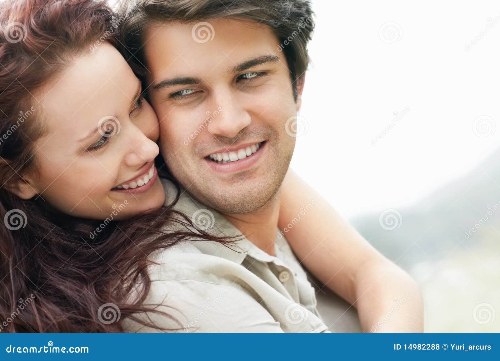 Smiling Female Hugging a Man from Behind Stock Photo - Image of outdoor ...