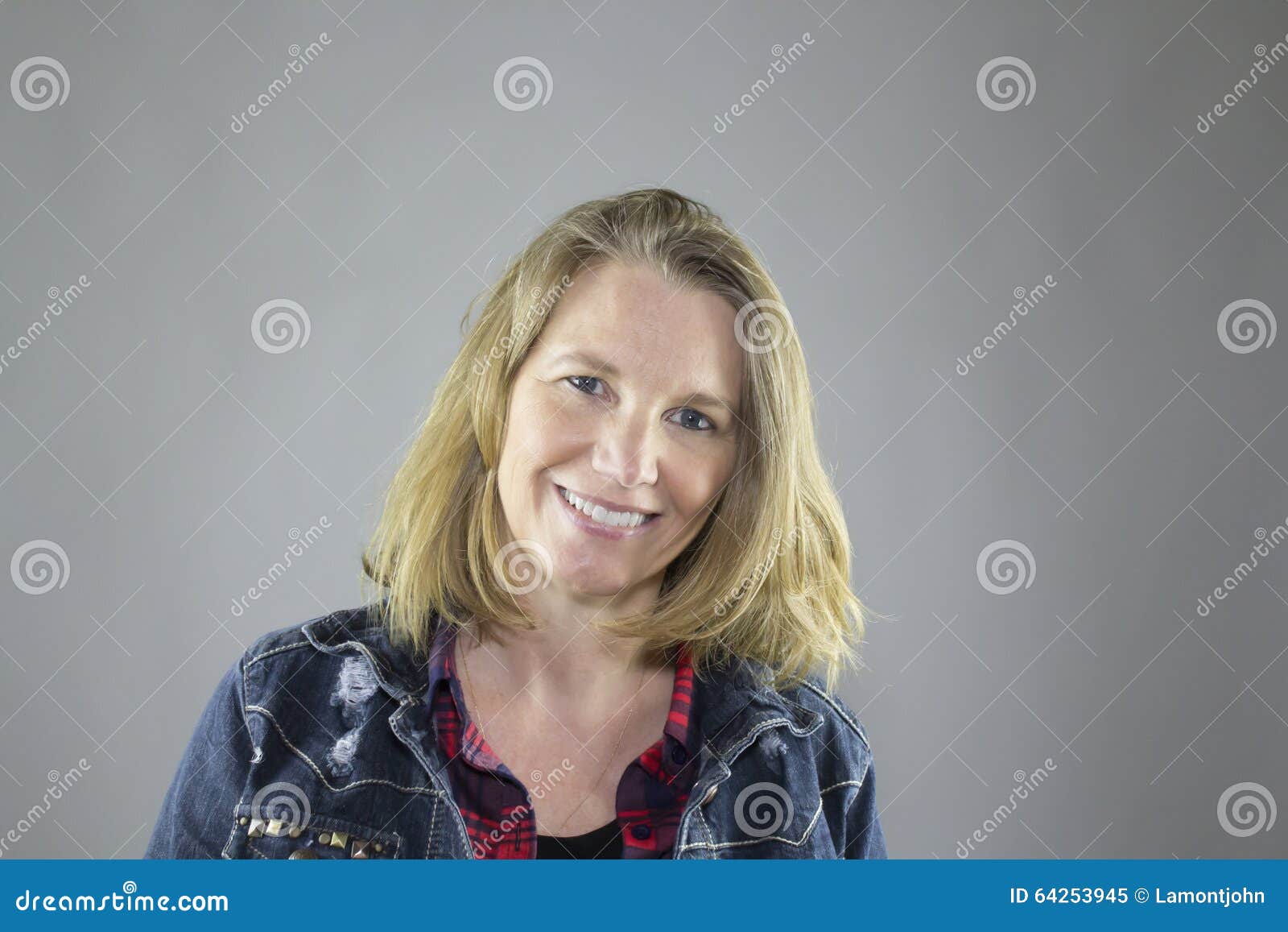 Smiling Female in Jacket 3 stock image. Image of aged - 64253945