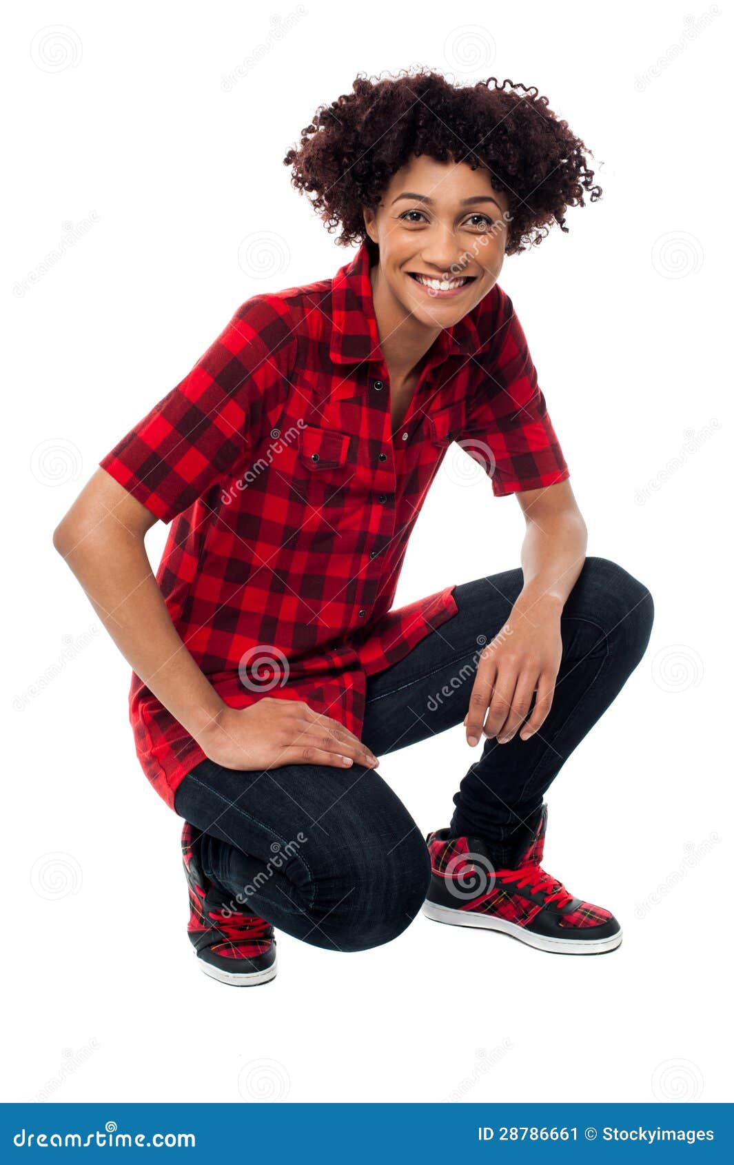 Smiling Female Model in Squatting Posture Stock Image - Image of ...