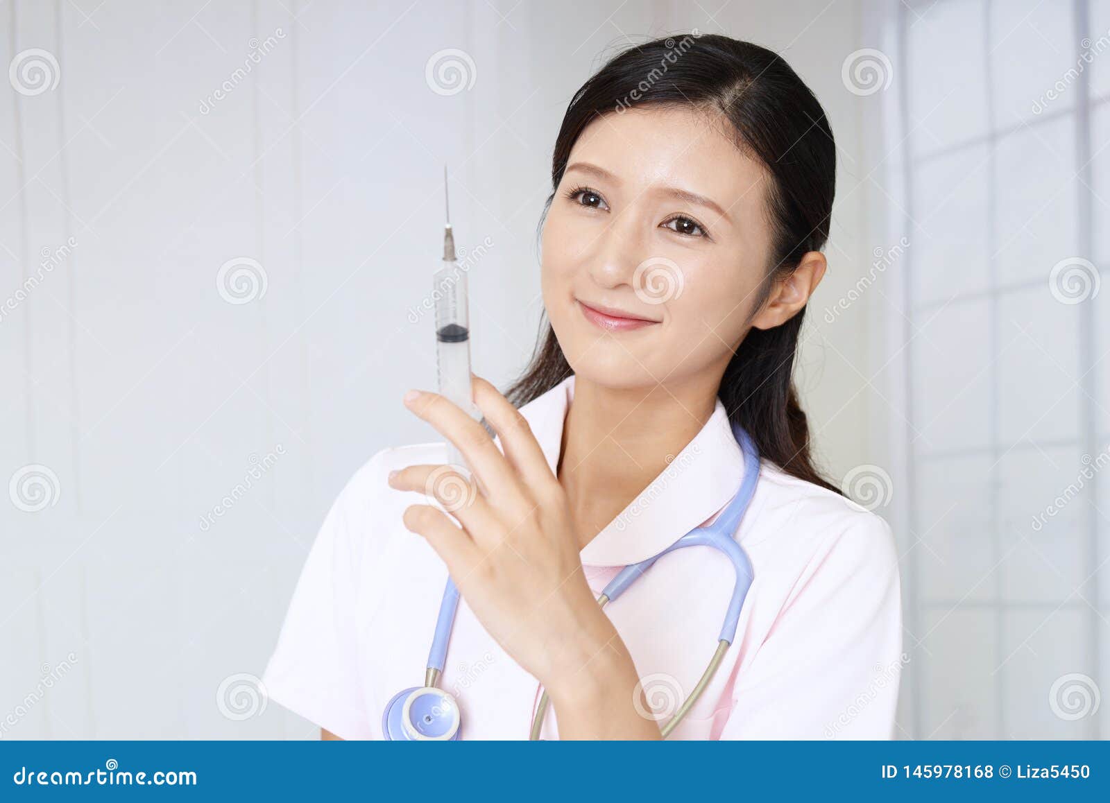 Smiling female nurse stock photo. Image of diagnosis - 145978168