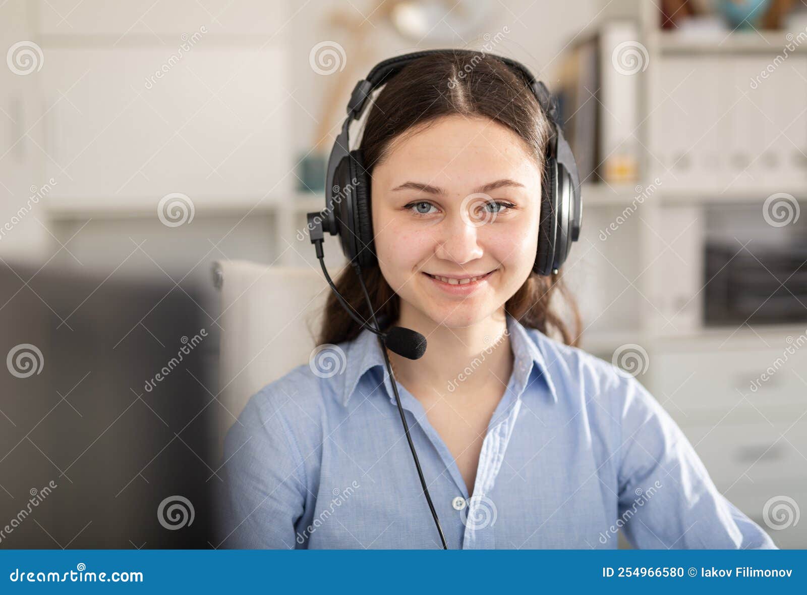 Smiling Female Operator Talking with Customer Using Headset Company ...