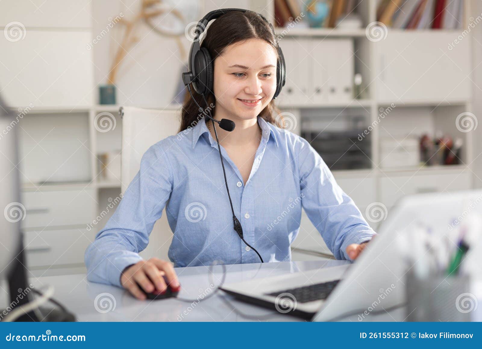 Smiling Female Operator Talking with Customer Using Headset Company ...