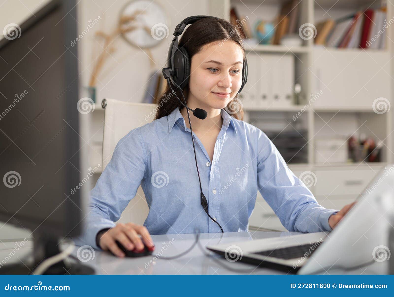 Smiling Female Operator Talking with Customer Using Headset Company ...