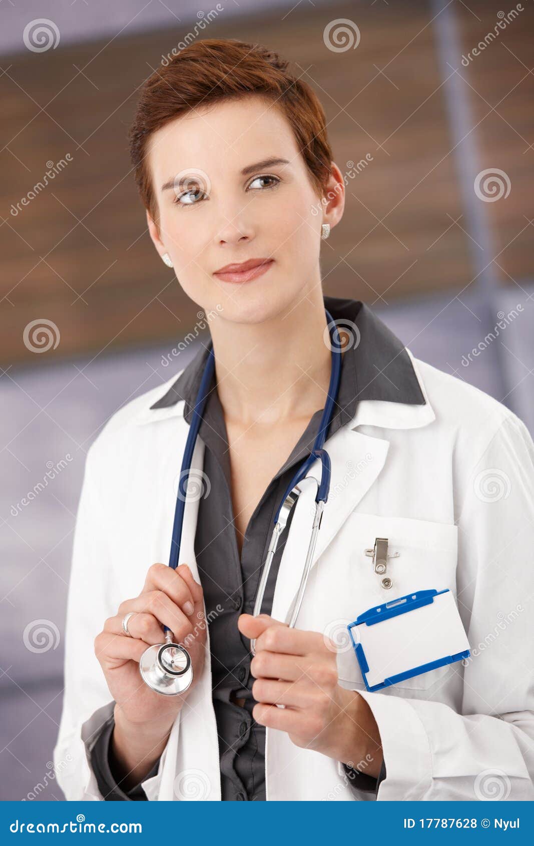 Smiling Female Physician in Smock Stock Photo - Image of clinical, hair ... Smiling Female Physician in Smock Stock Photo - Image of clinical, hair ...