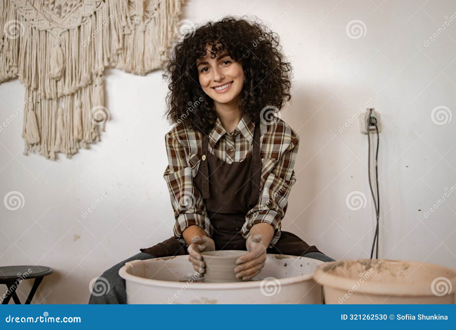 Smiling Female Potter Creating Ceramic Pottery Using Potter& X27;s ...
