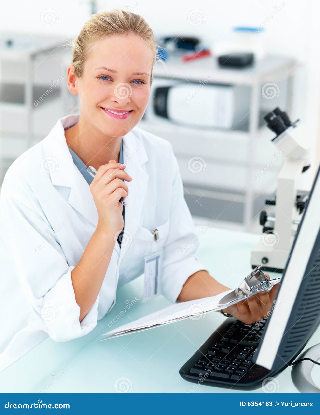 Smiling Female Researcher Sitting at a Laboratory Stock Image - Image ...