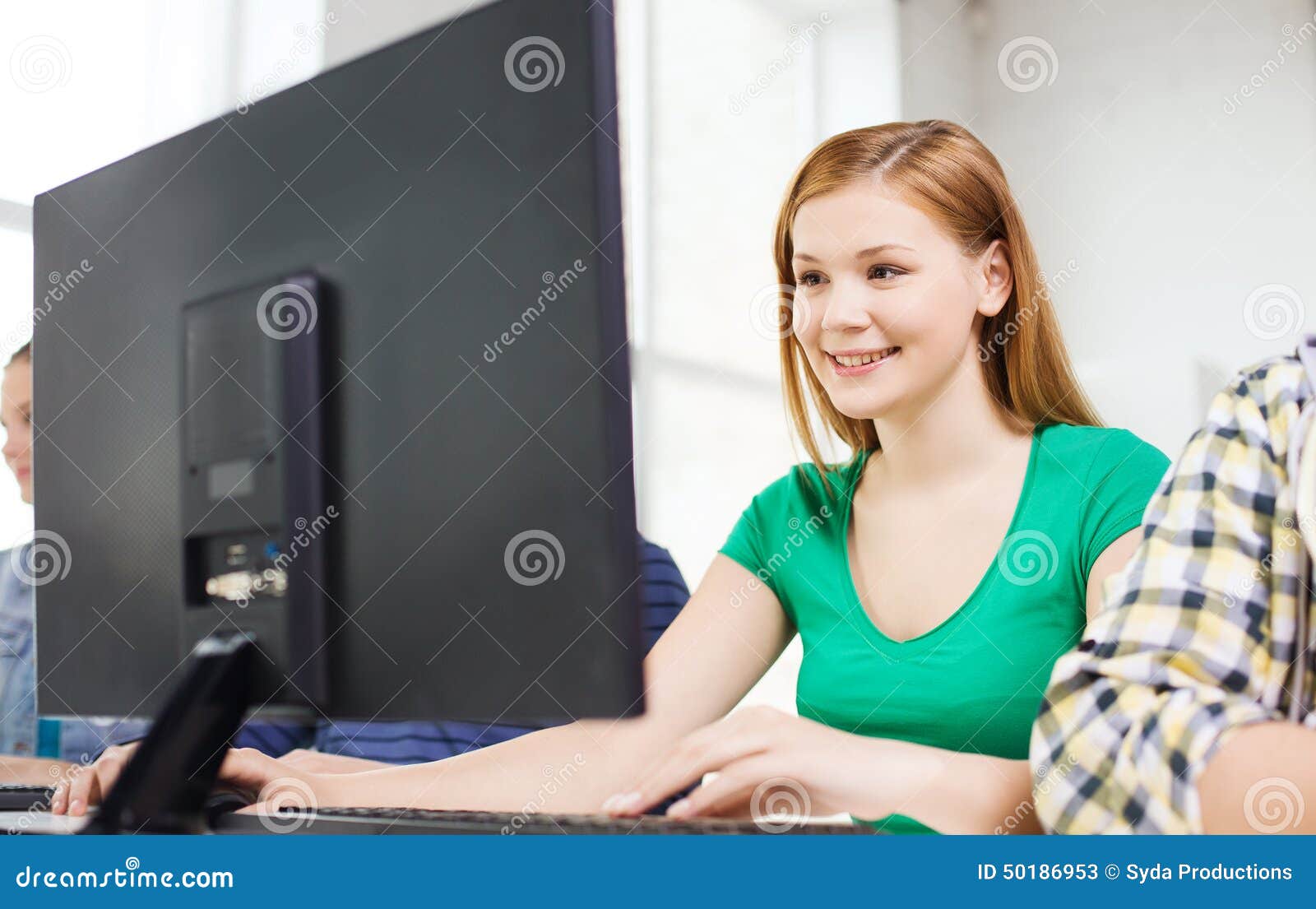 Smiling Female Student in Computer Class Stock Image - Image of ...